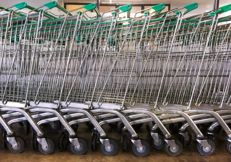 Parked Green Shopping Trolleys Stock Photo - Image of sale, store ...