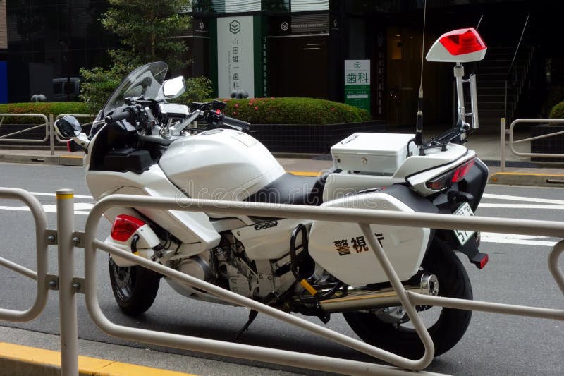 A Parked Motorcycle on Duty Editorial Stock Photo - Image of public ...