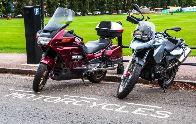 Parked Motorcycles Infront of a City Park Stock Image - Image of ...