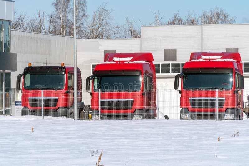 Parked Red Trucks Stand in a Row Editorial Photography - Image of ...