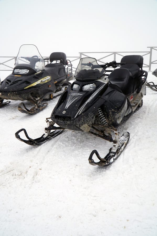 Parked Snowmobiles on the Top of the Mountain. Editorial Stock Image ...
