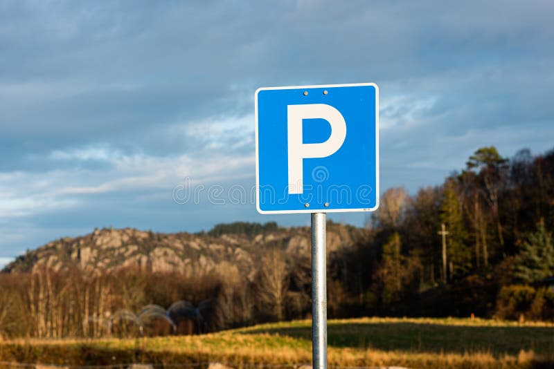 Parking Allowed Sign. Trees and Mountains in the Background Stock Image ...