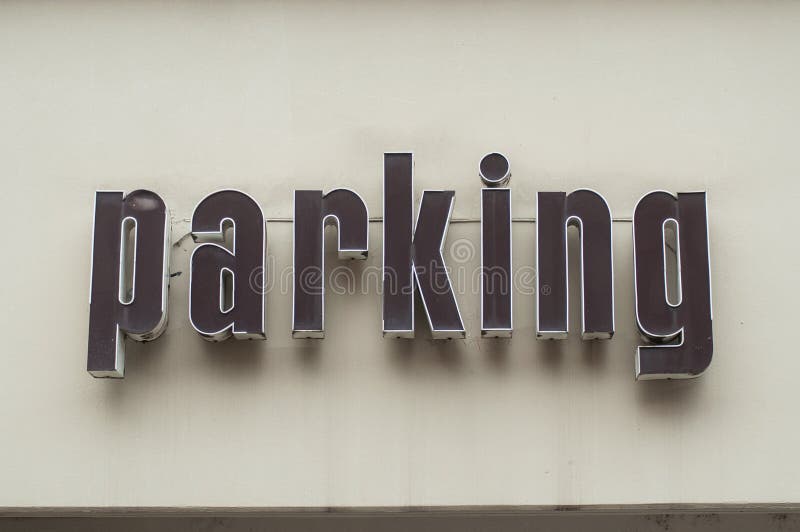 Parking Area Sign on Building in the Street Stock Image - Image of ...