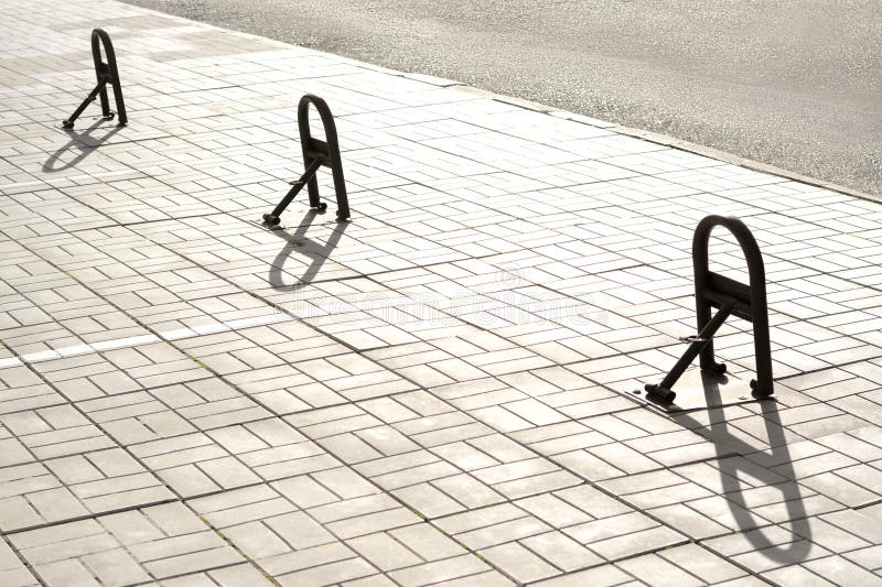 Parking Barriers on Pavement Near Road Outdoors Stock Photo - Image of ...