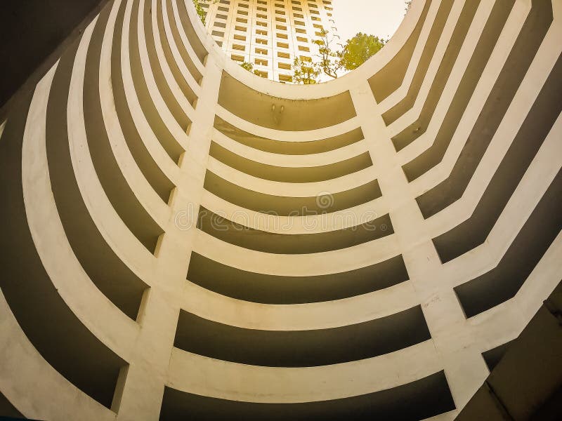 Parking Garage on the Building in Oval Structure. Stock Image - Image ...