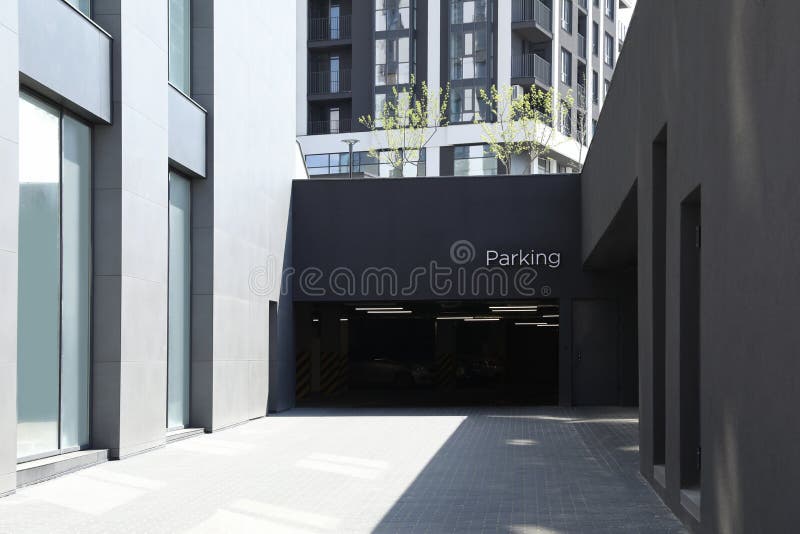 Parking Garage with Metal Gate in Modern Building Stock Image - Image ...