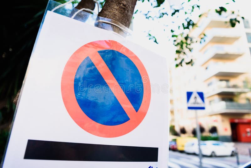 Parking Prohibited Sign on a Busy Street Stock Photo - Image of park ...