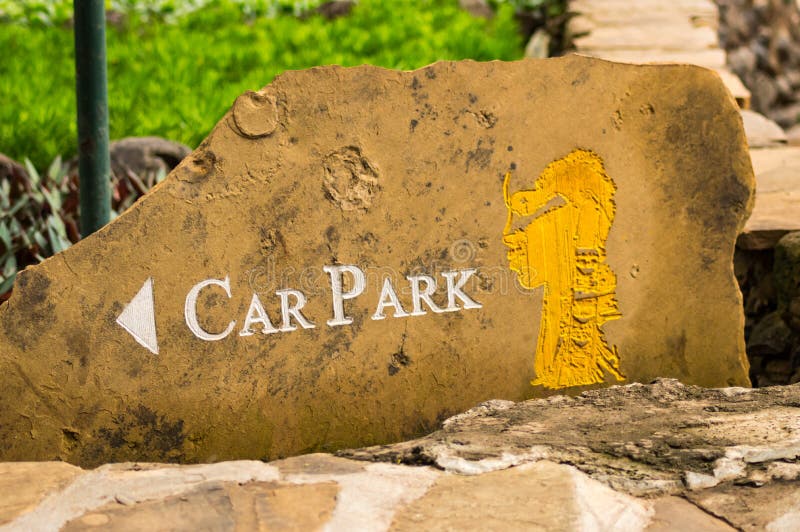 Parking Sign for Car Engrave in a Stone Stock Image - Image of yellow ...