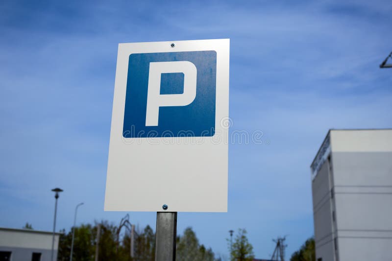 Parking Sign in Front of Building Stock Photo - Image of sidewalk ...