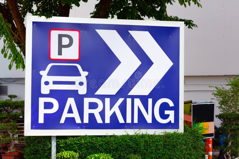Parking Sign in Front of a Department Store Stock Image - Image of ...