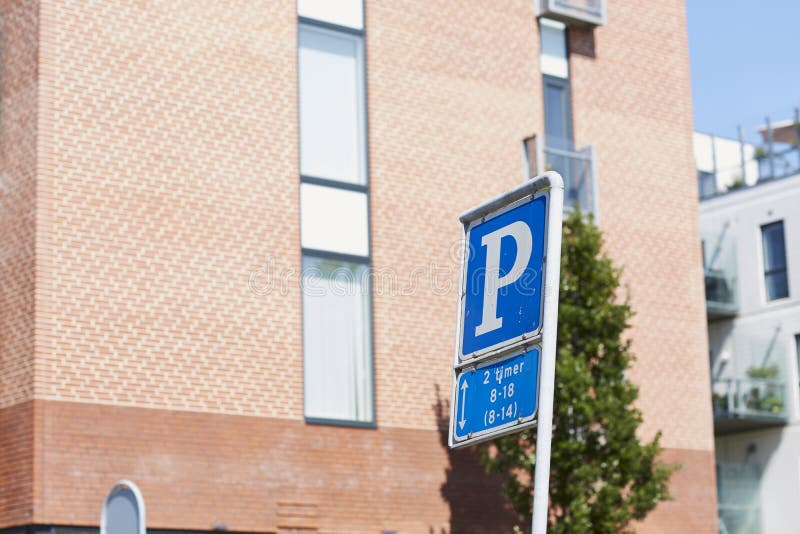 Parking Sign Hanging High Up Stock Image - Image of path, wall: 197221081