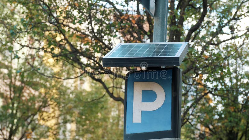 A Parking Sign Powered by a Solar Panel on a Pole. Environmentally ...