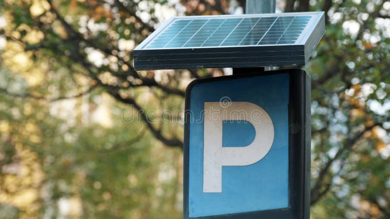 A Parking Sign Powered by a Solar Panel on a Pole. Environmentally ...