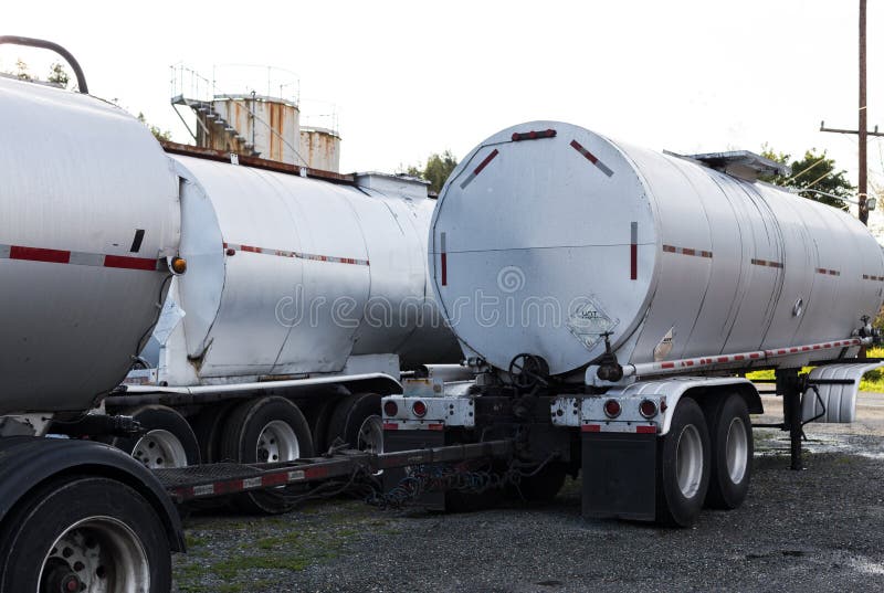 Cisterns in the Parking Lot Stock Photo - Image of road, vehicle: 160267896