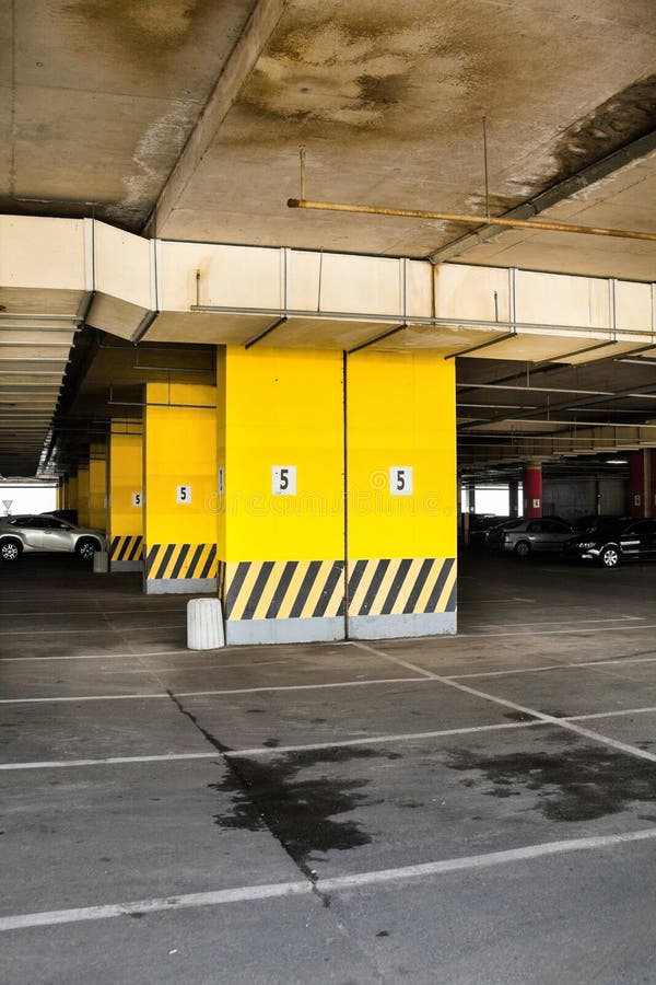 Car Parking Under a High-rise Building. Cars are Parked Near the Forest ...
