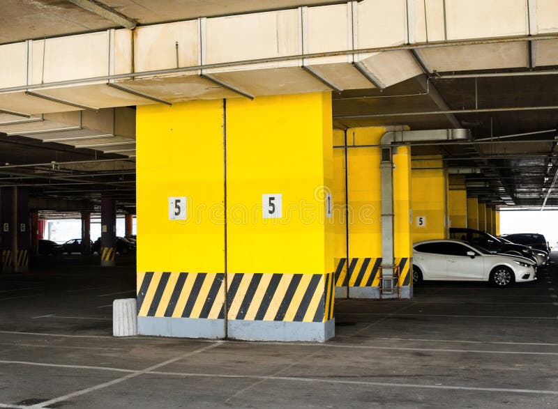 Car Parking Under a High-rise Building. Cars are Parked Near the Forest ...