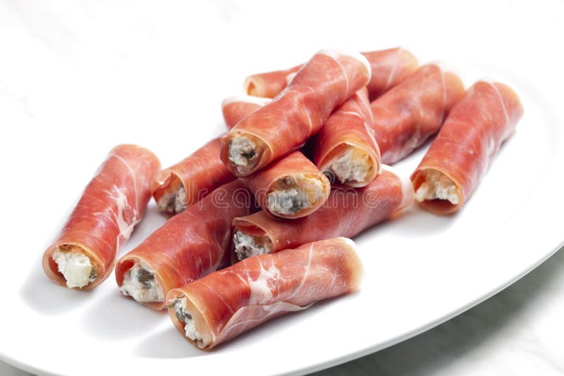 Parma Ham Rolls Filled with Cream Cheese, Galia Melon and Capers Stock ...