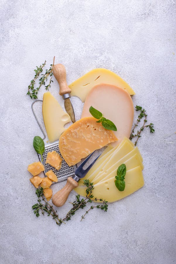 Parmesan, Cheddar, Gouda and Maasdam Cheese Stock Image - Image of ...