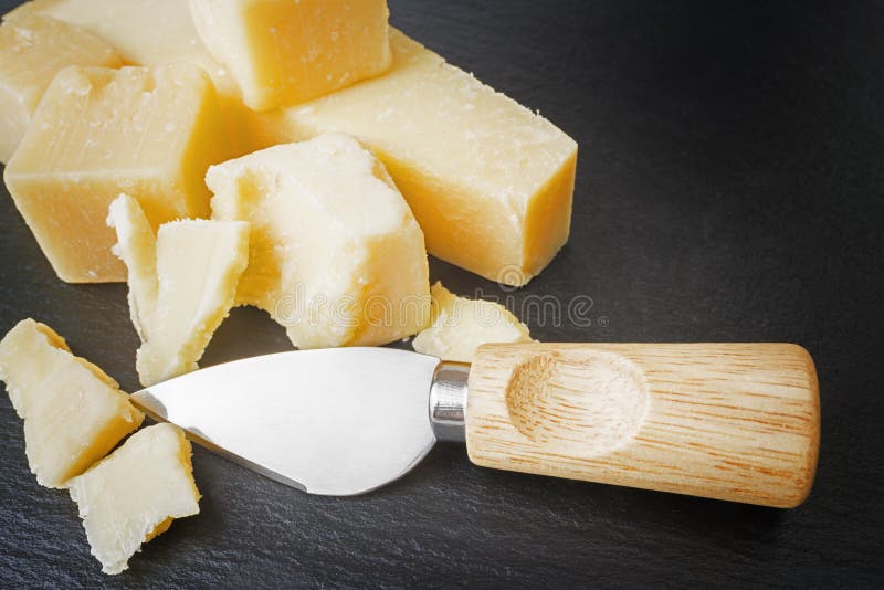 Parmesan Cheese on Black Board Stock Image - Image of lunch, black ...