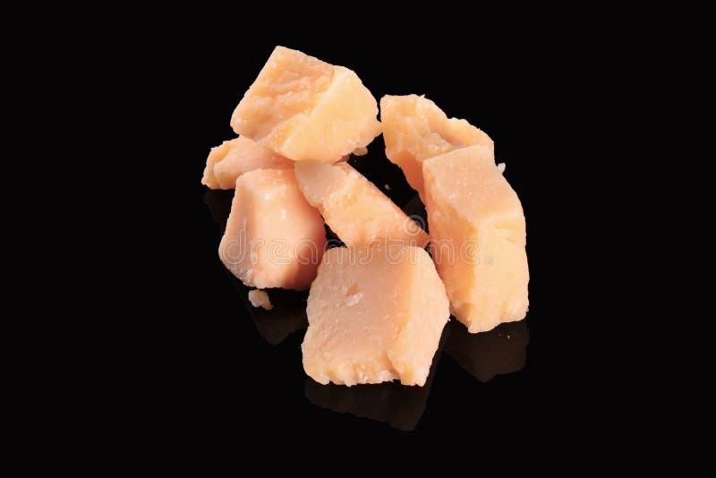 Parmesan Cheese on a Black Glossy Table with Reflection. Parmesan ...