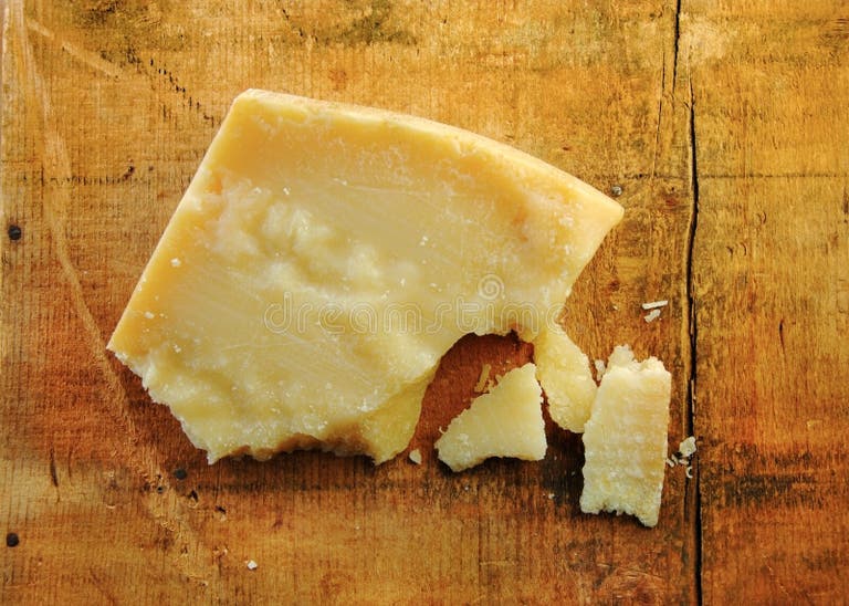 Parmesan Cheese Chunks on Wood Stock Image - Image of topping, food ...