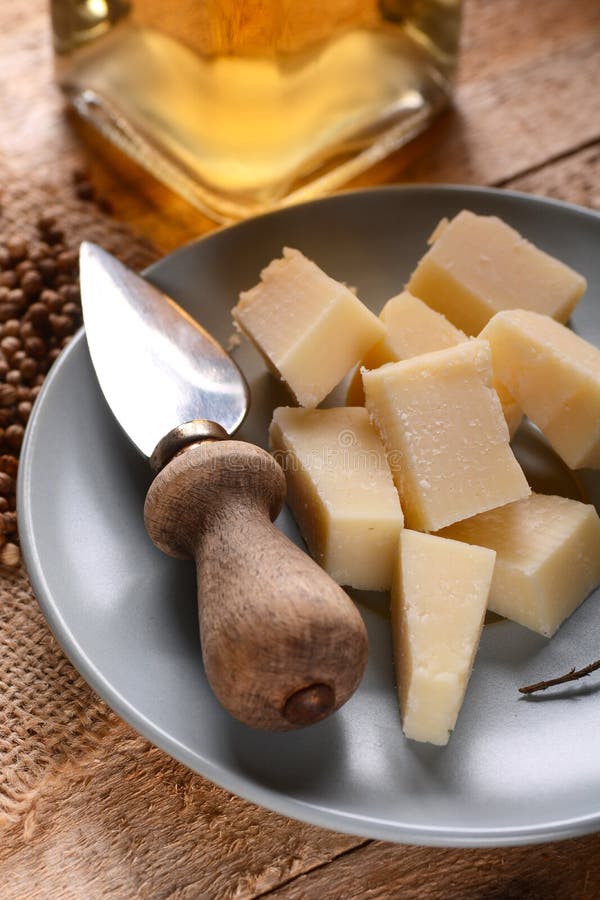 Parmesan cheese into cubes stock photo. Image of italy - 67558474