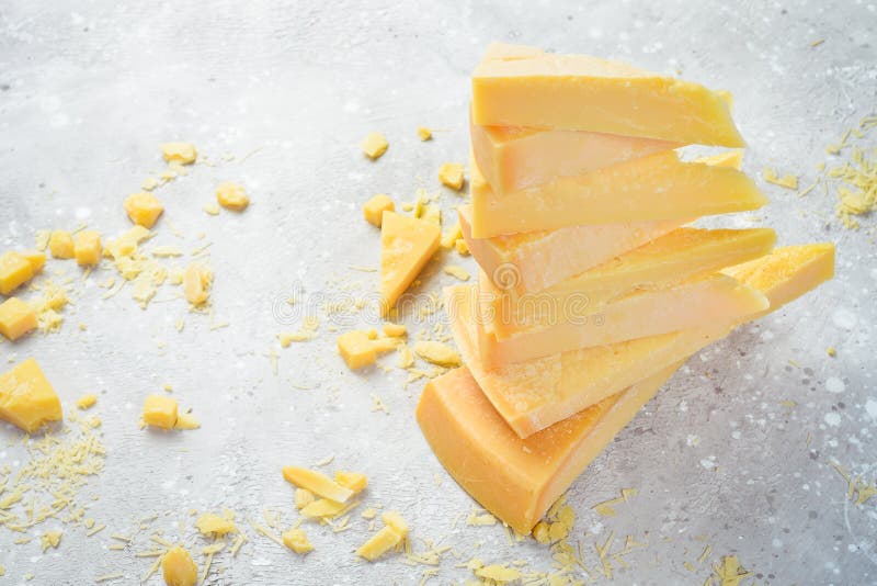 Parmesan Cheese Cut into Pieces. Cheese. Side View Stock Photo - Image ...