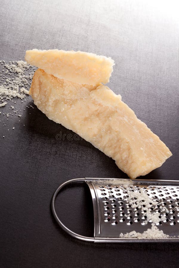 Fresh grated parmesan. stock image. Image of cusine - 115774219