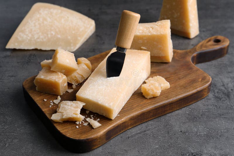 Parmesan Cheese with Knife on Grey Table Stock Image - Image of healthy ...