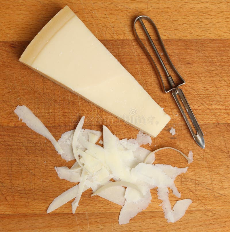 Parmesan Cheese Shavings stock photo. Image of peeler - 33603014