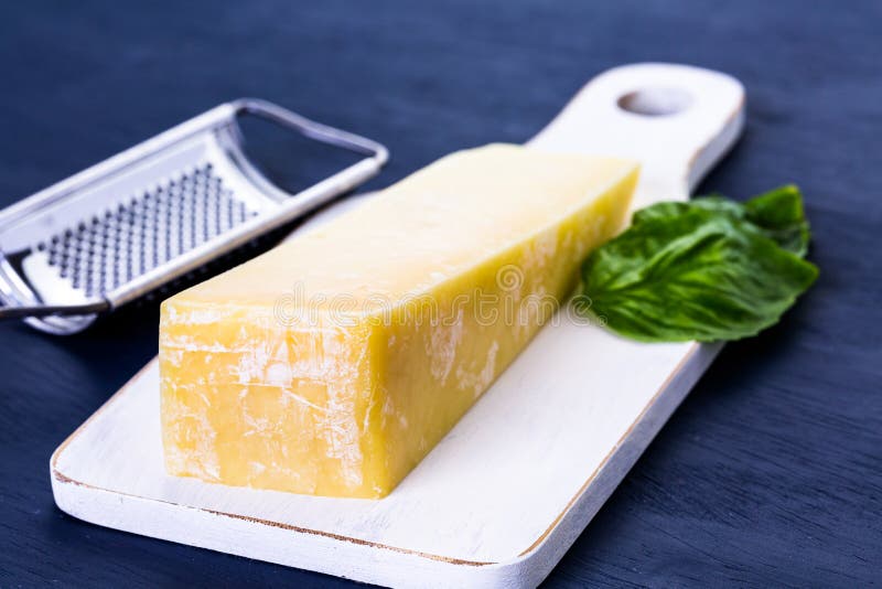 Parmesan cheese stock image. Image of slice, dairy, metal - 51499617