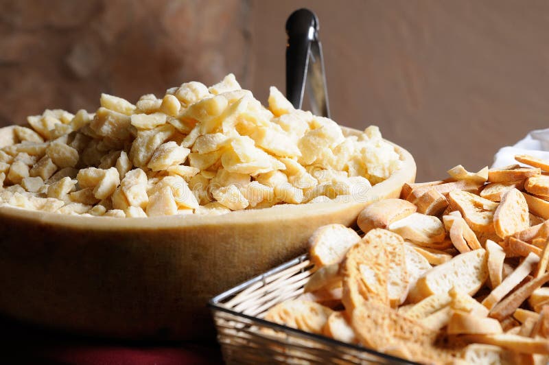 Parmesan Cheese and Slices of Toasted Bread on Table Stock Image ...