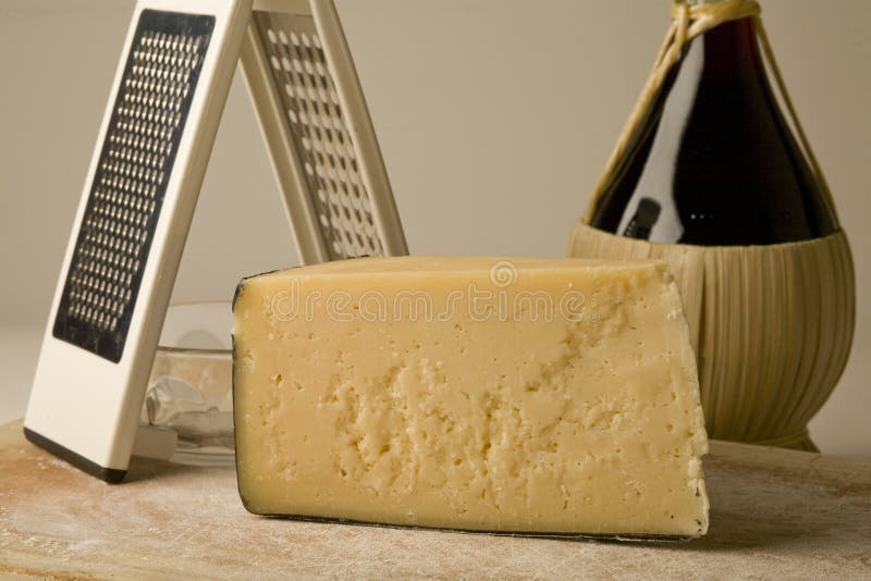 Parmesan cheese with wine. stock image. Image of dinners - 9758757