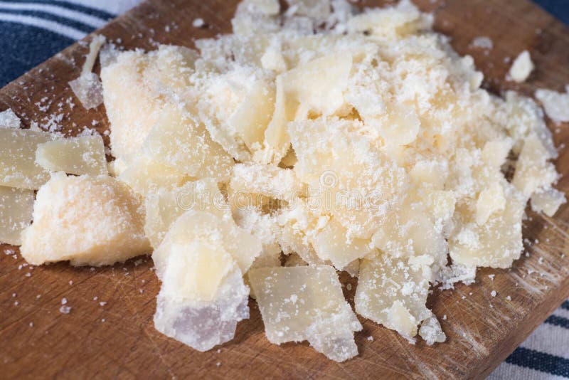 Pile Of Parmesan Cheese Flakes Stock Photo - Image of shot, image: 69286760