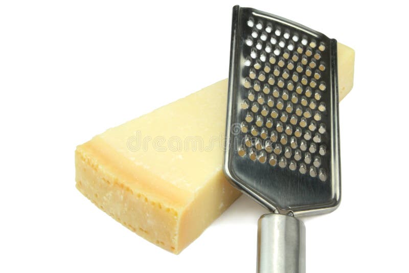 Parmesanost och rivjärn fotografering för bildbyråer. Bild av skiva ...
