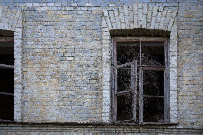 Part of Abandoned Building with Two Broken Windows Stock Photo - Image ...