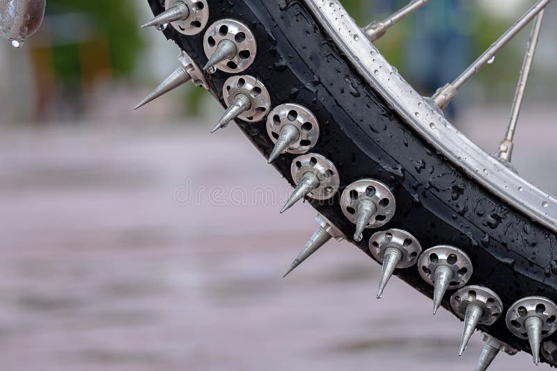 Part of the Bicycle Wheel Covered with Large Metal Spikes Stock Image ...