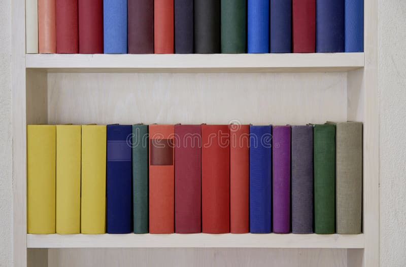 Part of Bookcase with Colorful Covers in White Wall Stock Image - Image ...