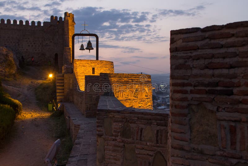Part of the Brick Wall of the Tower with a Cross and Bells Stock Image ...