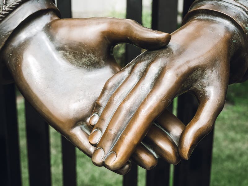 Hand Of Bronze Statue With A Finger Indicating To The Sky Stock Photo ...