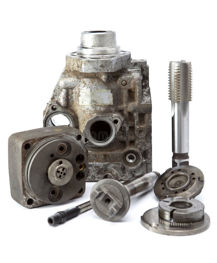 Part of Car High Pressure Pump and the Tool for Repair on White ...