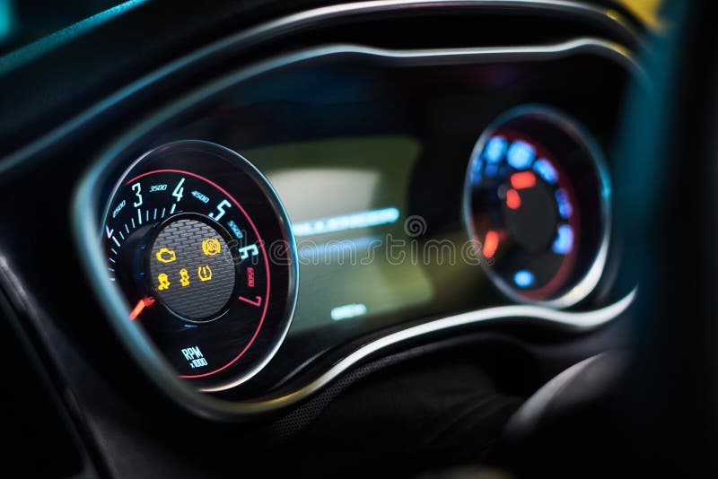 Part of Car Interior with Instrument Panel Containing Two Speedometers ...