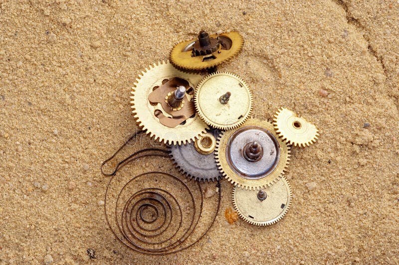 Part of Clockwork Mechanism on the Sand Stock Photo - Image of ...