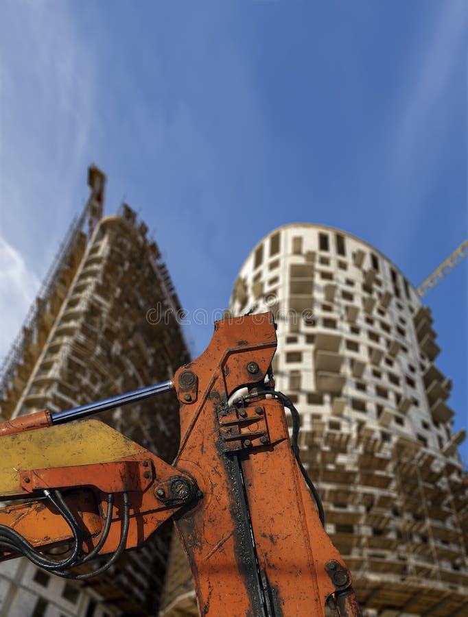 Part of a Construction Machine with Multi-storey Building Under ...