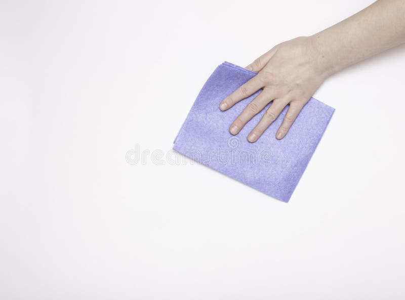 Part of the Hand with a Blue Cloth for Dusting and Removing Dirt ...