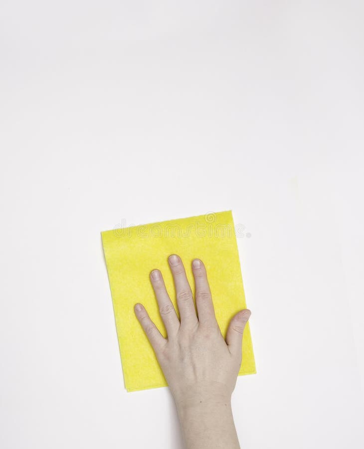 Part of the Hand with a Yellow Cloth for Dusting and Removing Dirt ...