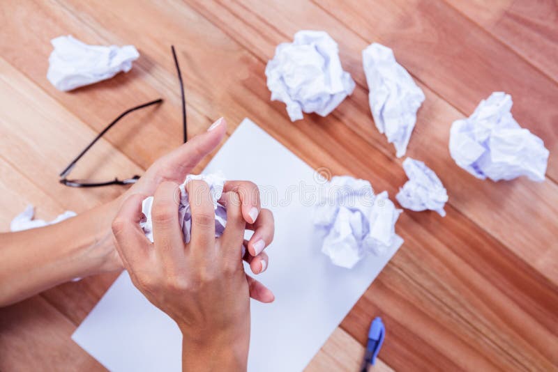 Hands Crumpling Papers on Desk Stock Photo - Image of messy, paper ...