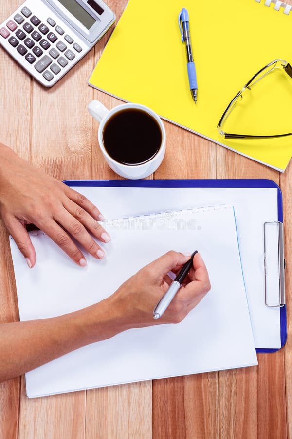 Part of hands taking notes stock image. Image of style - 62323161