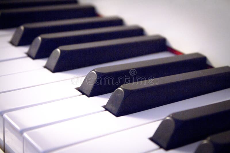 Part of the Keyboard of a Piano in White Color Stock Photo - Image of ...