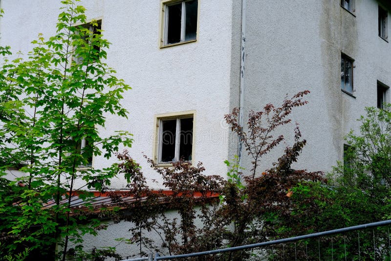 Part of a Large Multi-storey Abandoned Building with Broken Windows ...